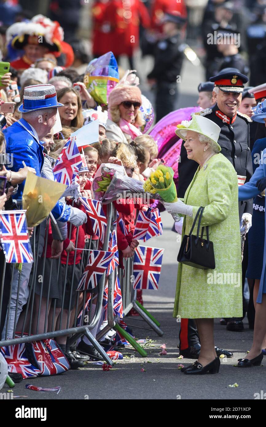 Queen Elizabeth II greets crowds outside Windsor Castle in Berkshire as ...