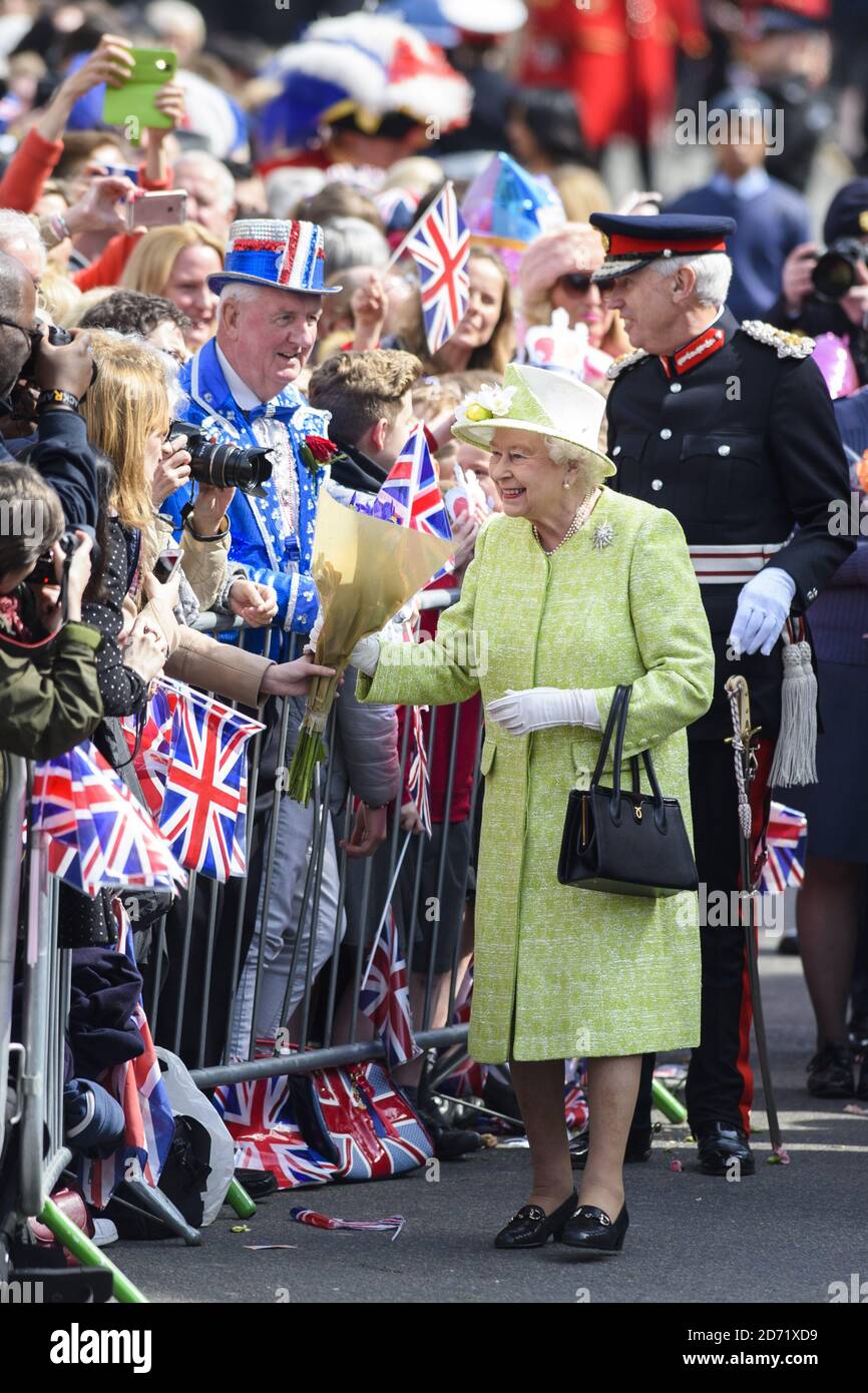 Queen Elizabeth II greets crowds outside Windsor Castle in Berkshire as ...