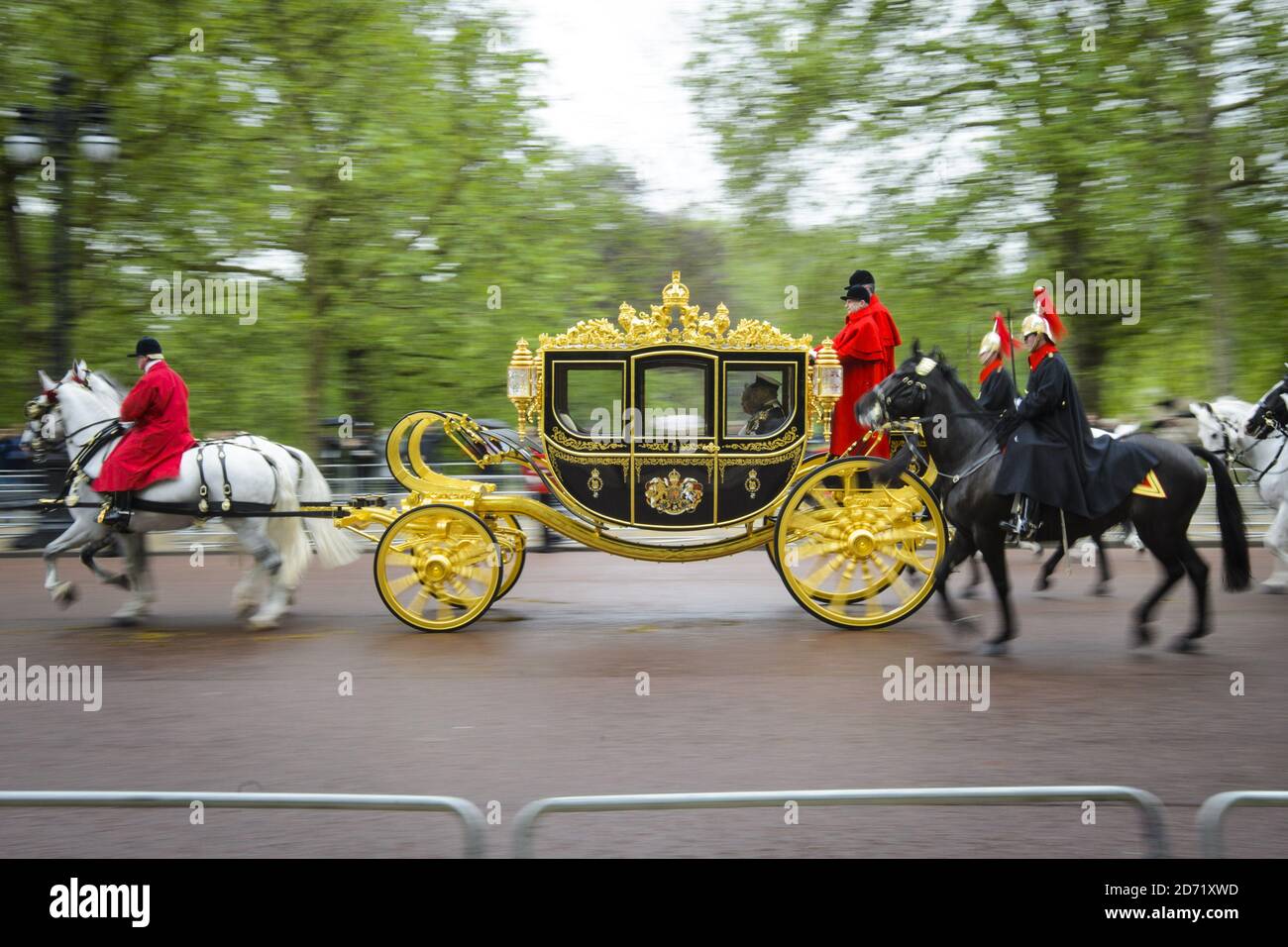 The Irish State Coach transporting Queen Elizabeth II travels along The ...