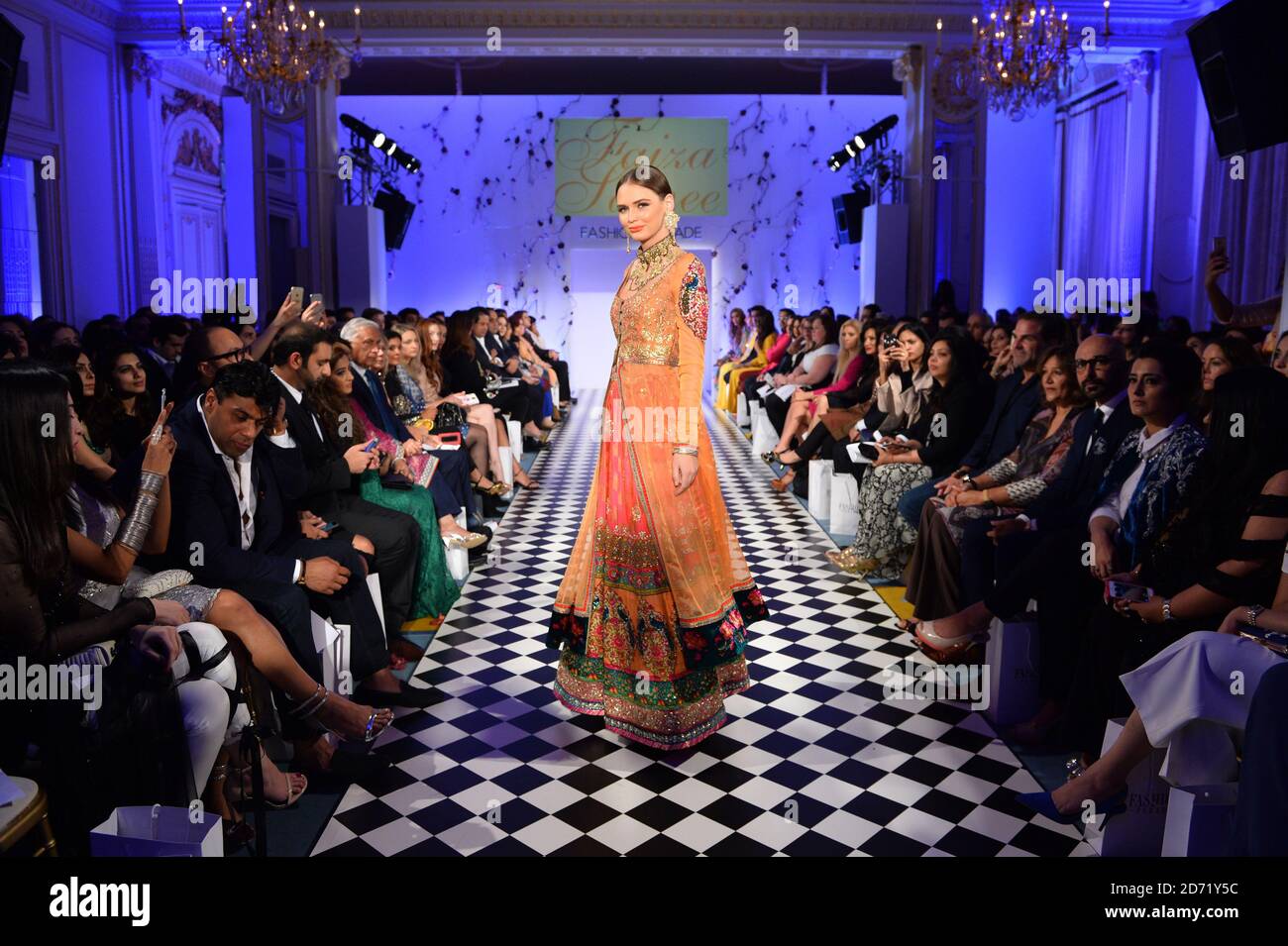 A model wears a design by Faiza Samee at Fashion Parade, showcasing the ...