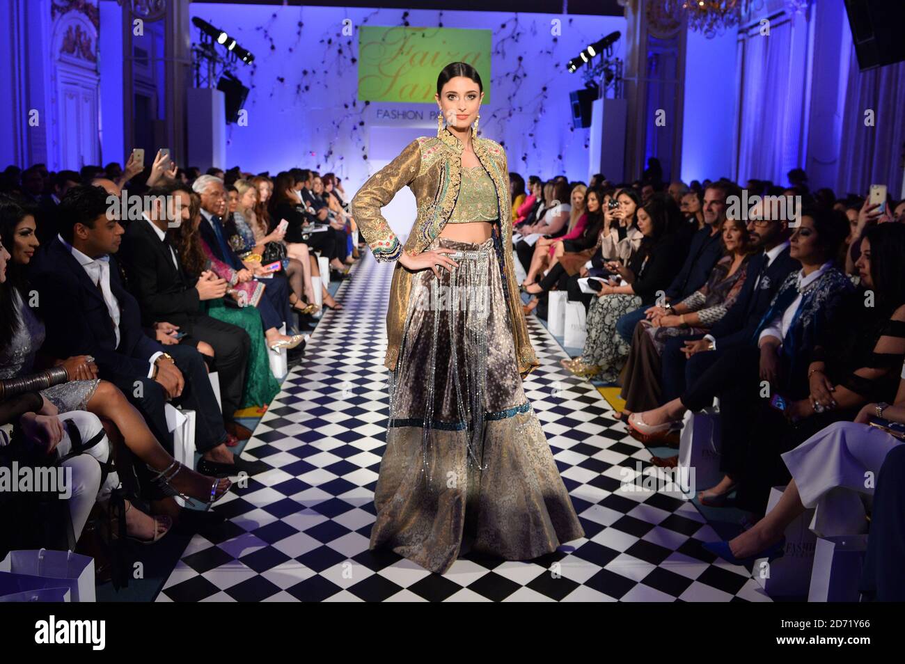 A model wears a design by Faiza Samee at Fashion Parade, showcasing the ...