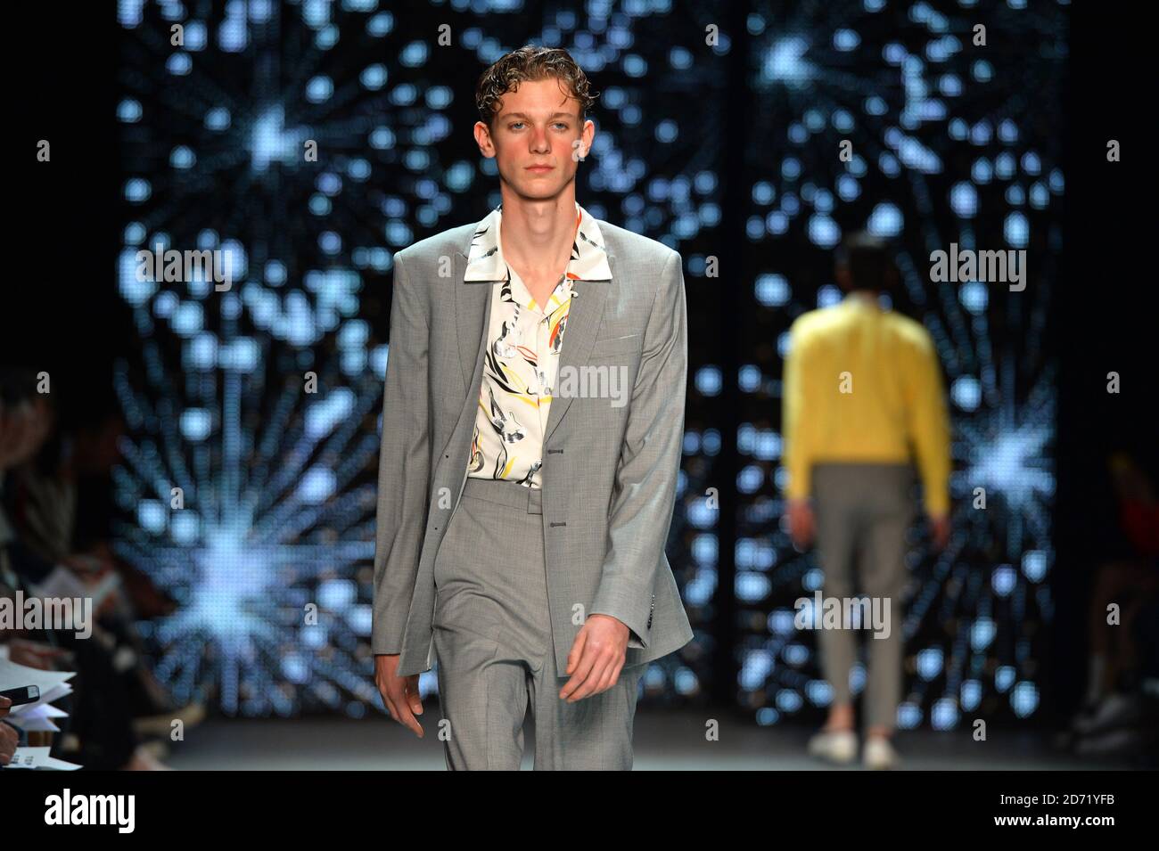A model on the catwalk at the Top Man Design fashion show, held at the ...
