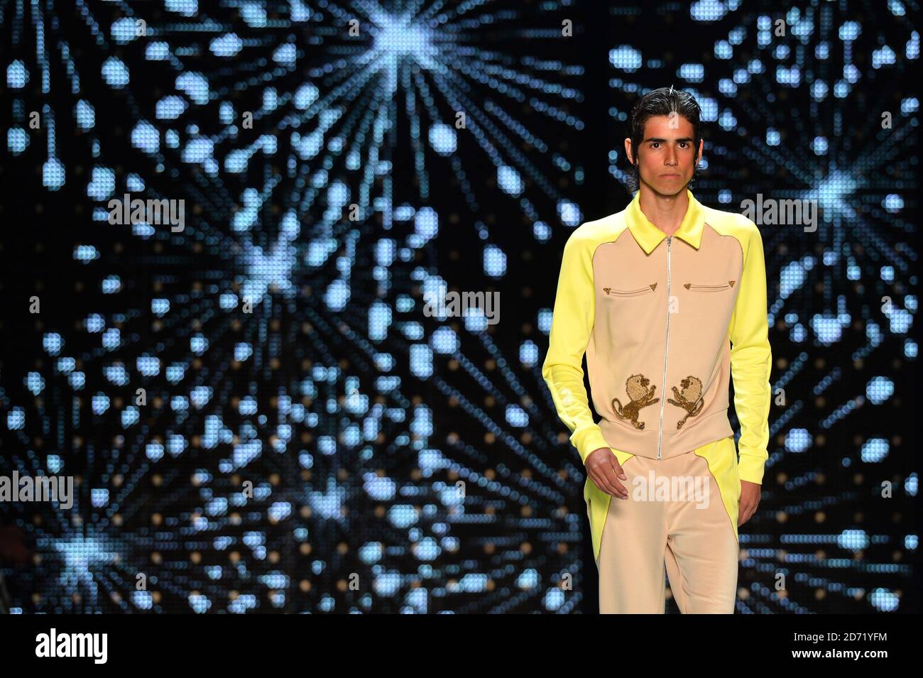 A model on the catwalk at the Top Man Design fashion show, held at the ...