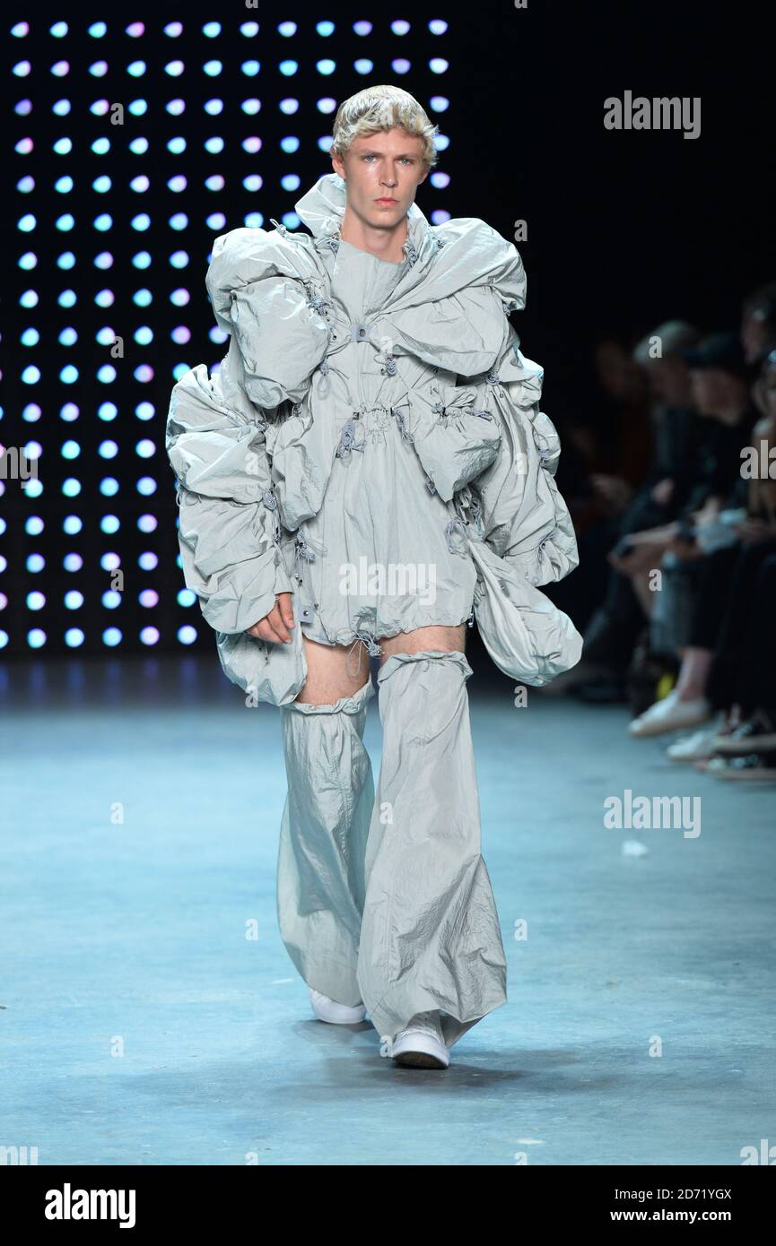 A model wears a design by Feng Chen Wang during the MAN fashion show ...