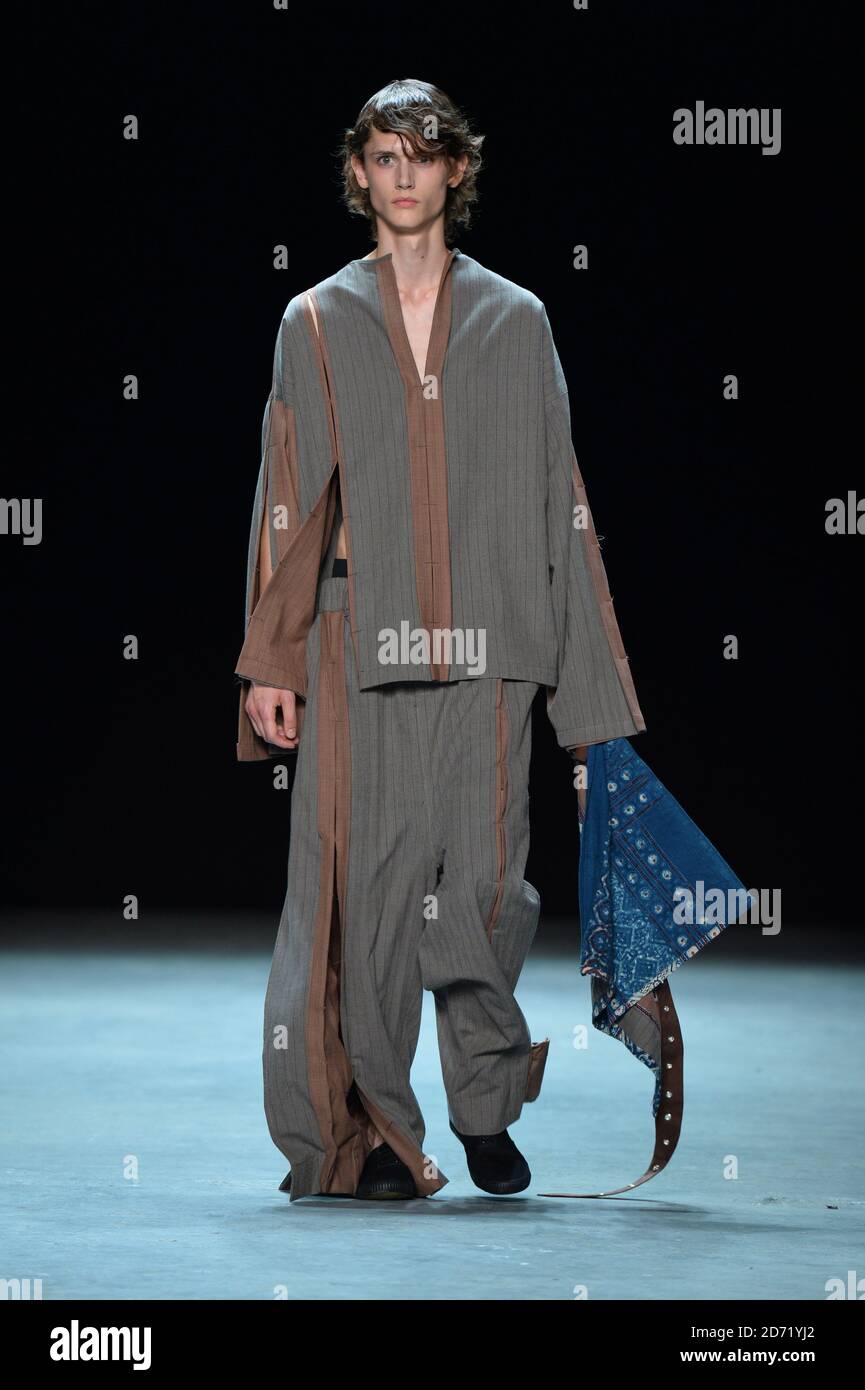 A model on the catwalk at the Craig Green fashion show, held at the ...