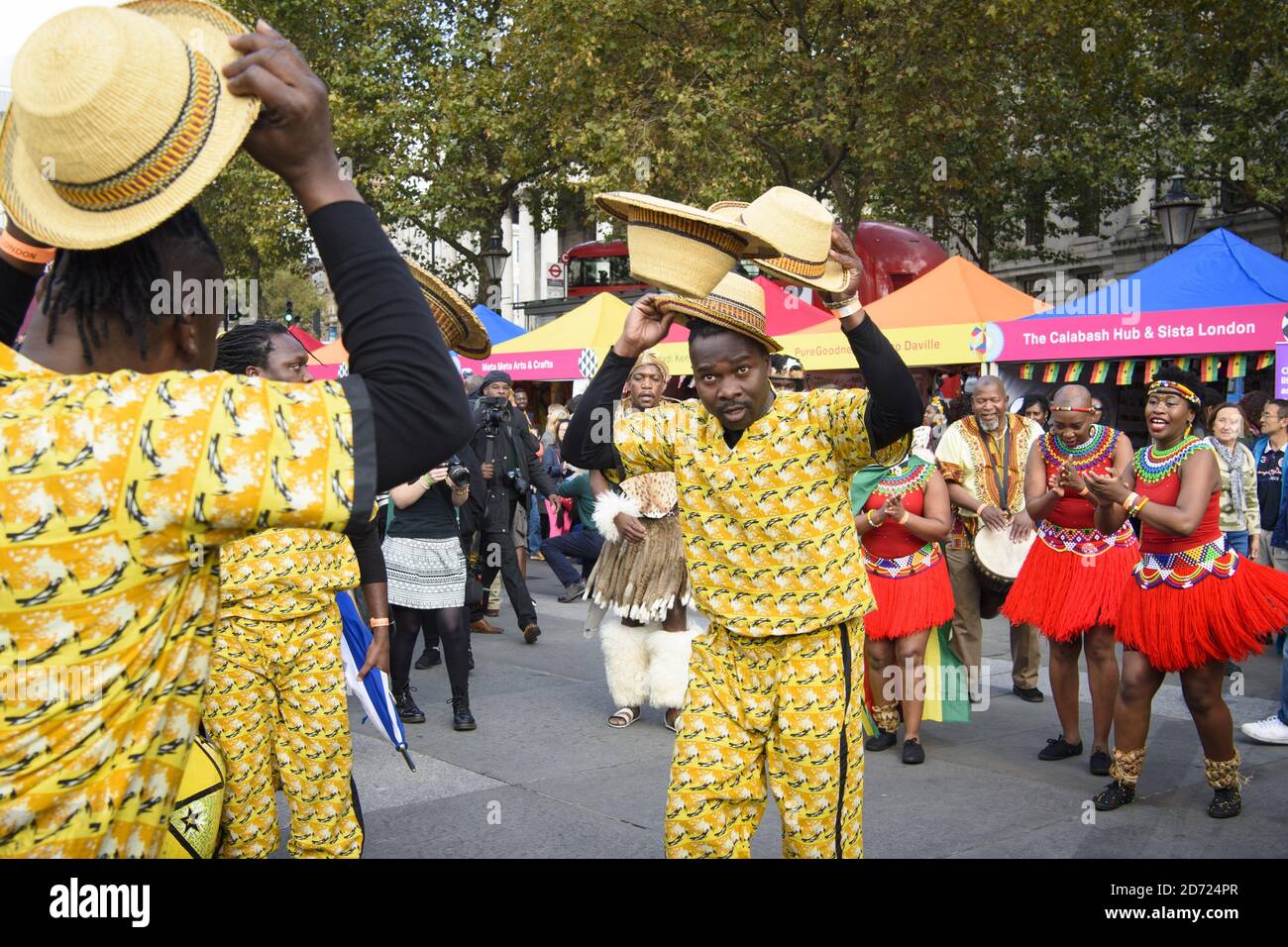 Dancers in a procession during Africa on the Square, an event ...