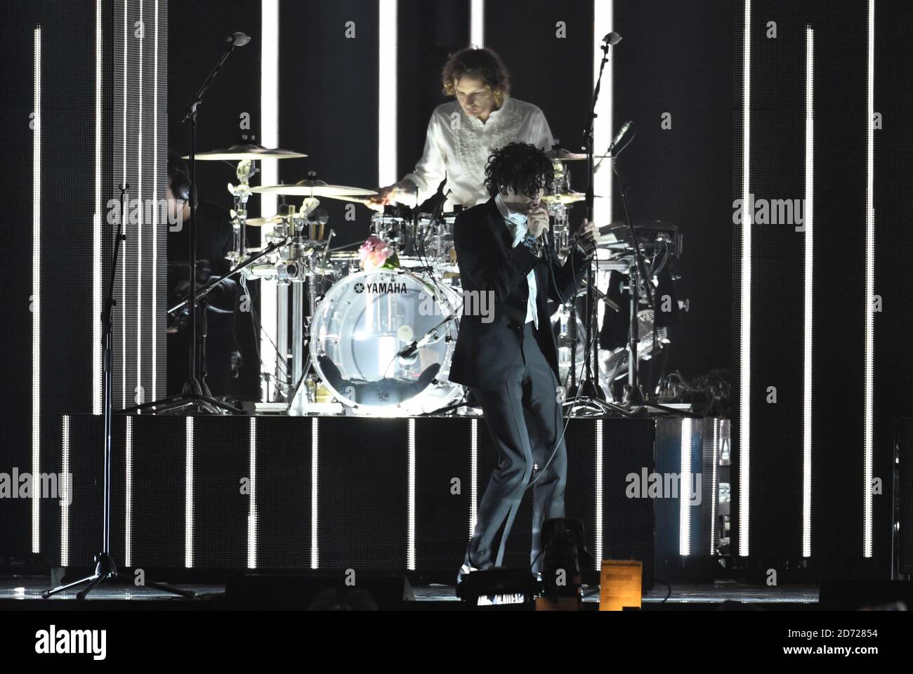 The 1975 on stage at the BRIT Awards 2017, held at The O2 Arena, in ...