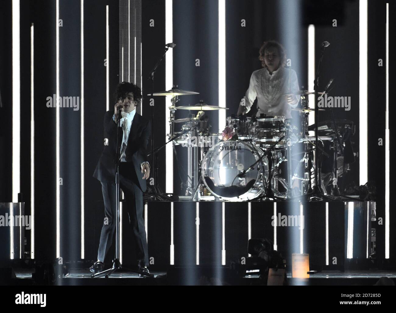The 1975 on stage at the BRIT Awards 2017, held at The O2 Arena, in ...