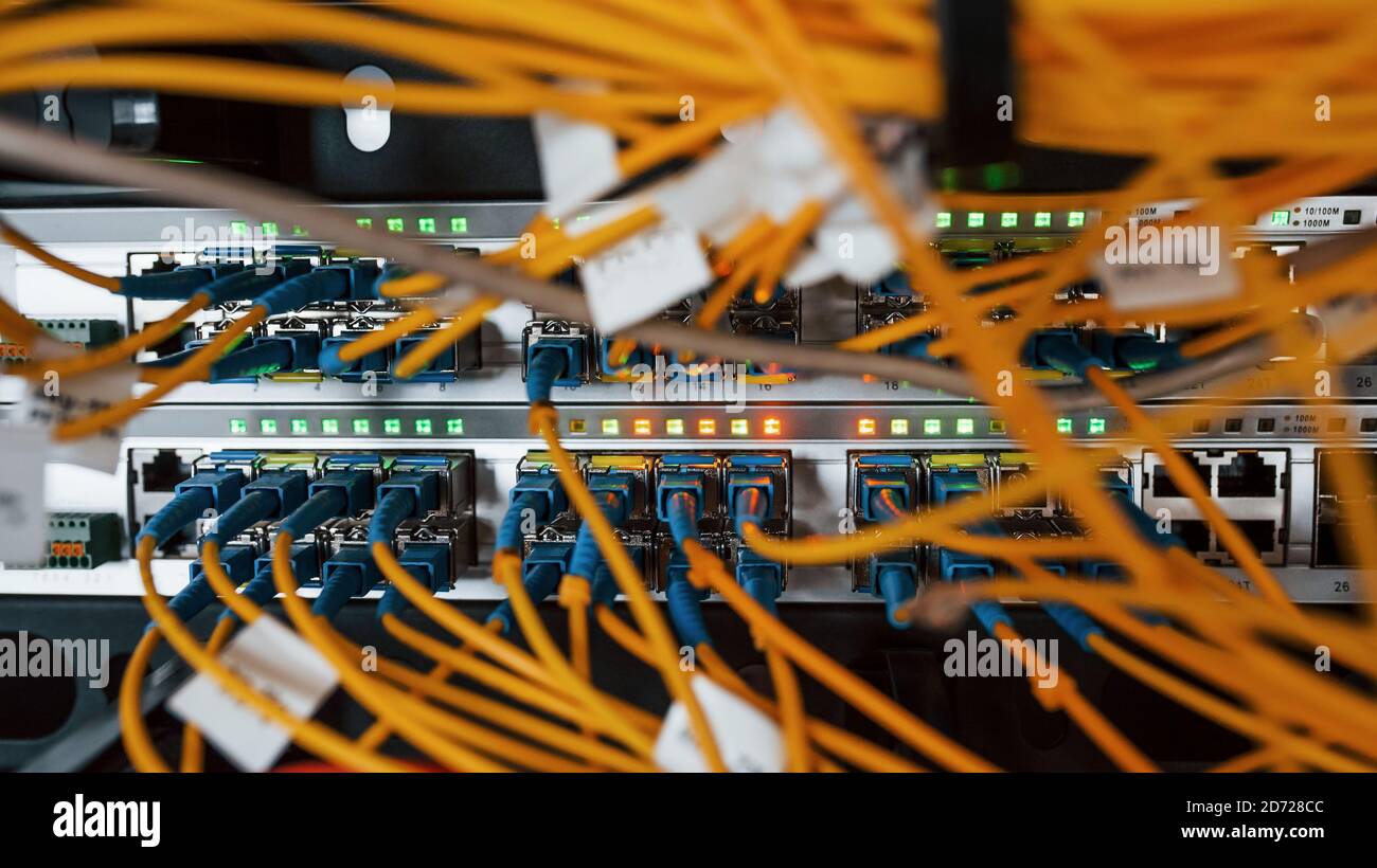 Close up view of internet equipment and cables in the server room Stock ...