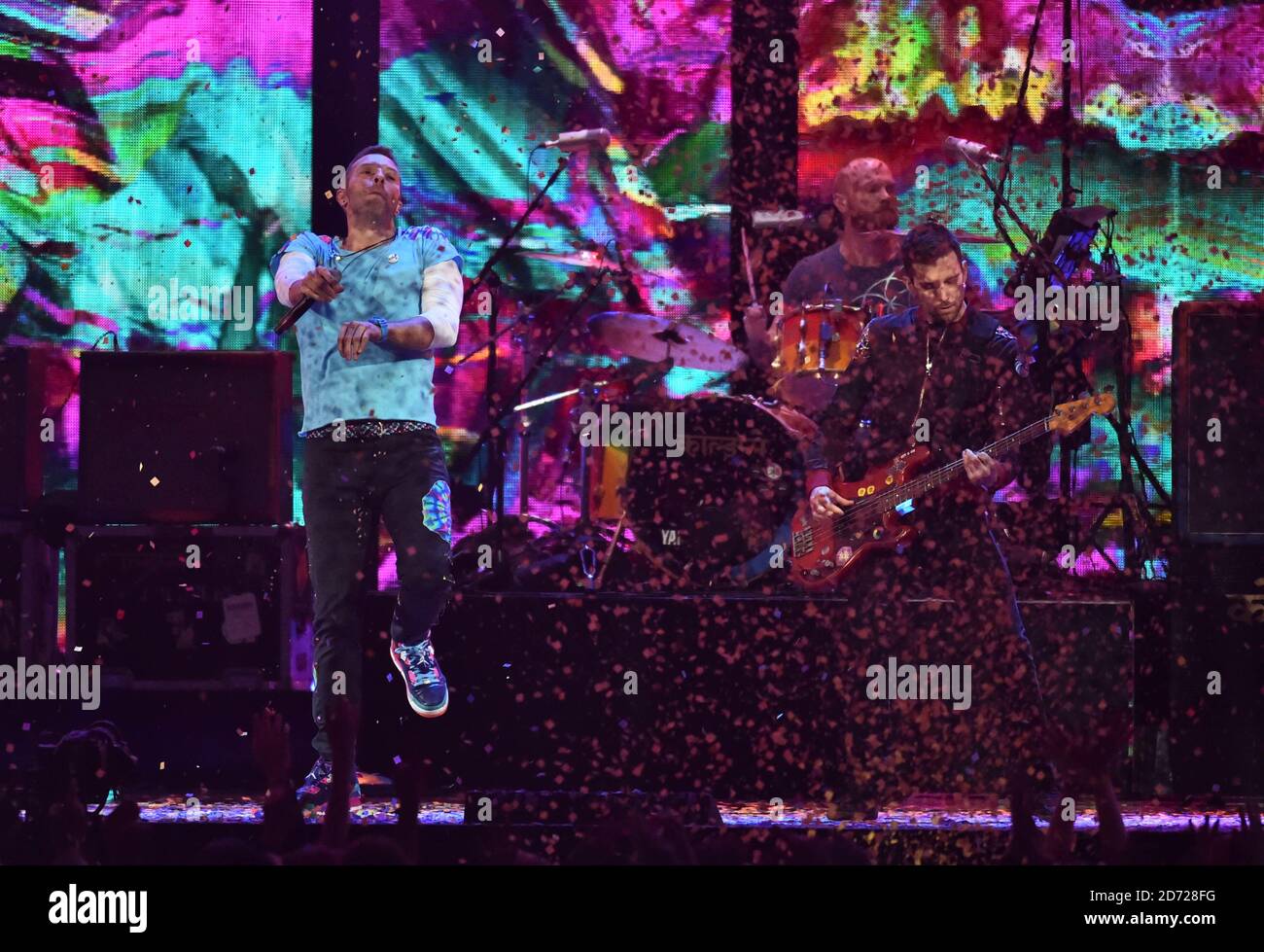 Coldplay performing on stage at the o2 arena in london hi-res stock ...