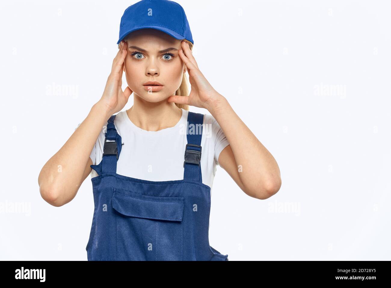 Woman in working uniform blue cap delivery courier delivery service ...