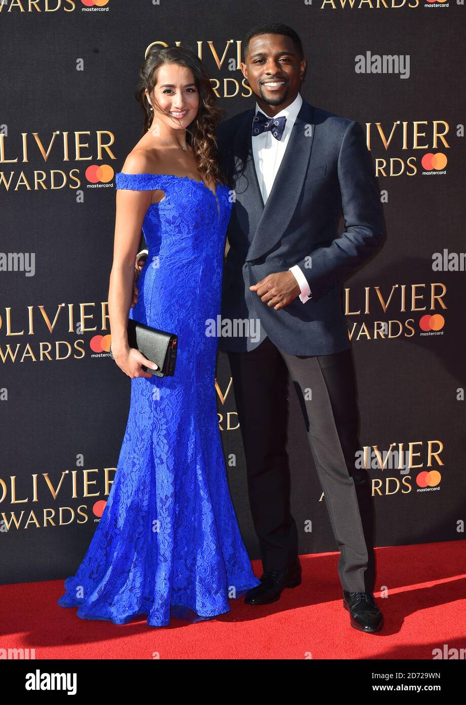 Adam J Bernard (right) and guest attending the Olivier Awards 2017 ...