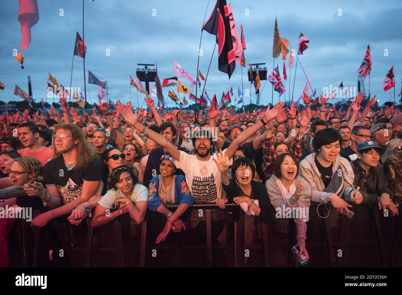 The crowd watch Radiohead performing during the Glastonbury Festival at ...