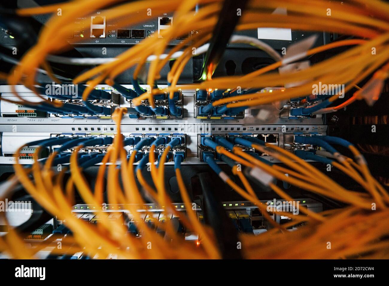 Close up view of internet equipment and cables in the server room Stock ...