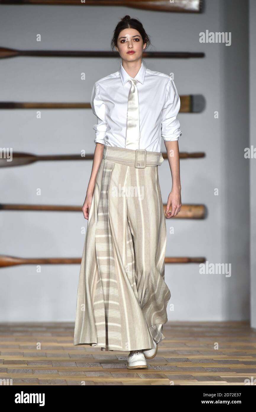 Models on the catwalk during the Daks London Fashion Week SS18 show ...