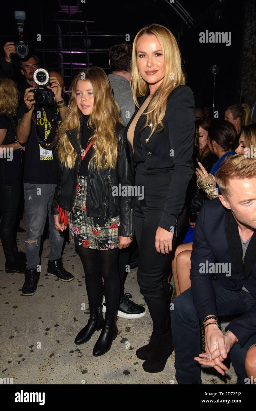 Amanda Holden and daughter Alexa on the front row during the Julien ...
