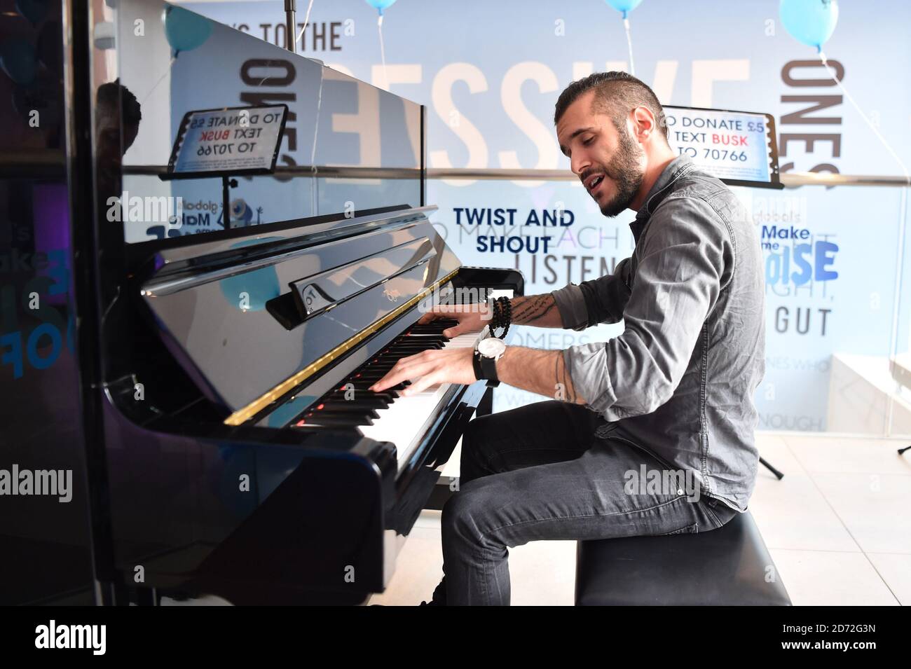 Alberto Giurioli busking in reception during Global's Make Some Noise ...