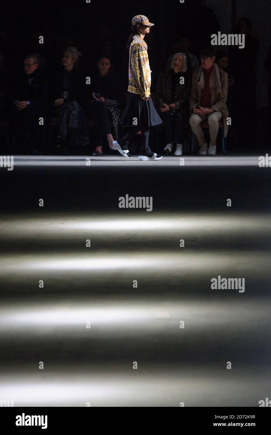 Models on the catwalk at the Burberry London Fashion Week show, held at ...