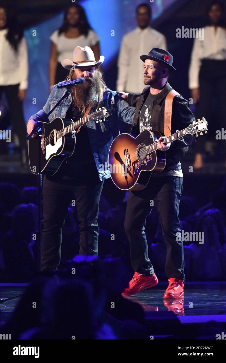 EDITORIAL USE ONLY. Chris Stapleton and Justin Timberlake perform on stage at the Brit Awards at ...