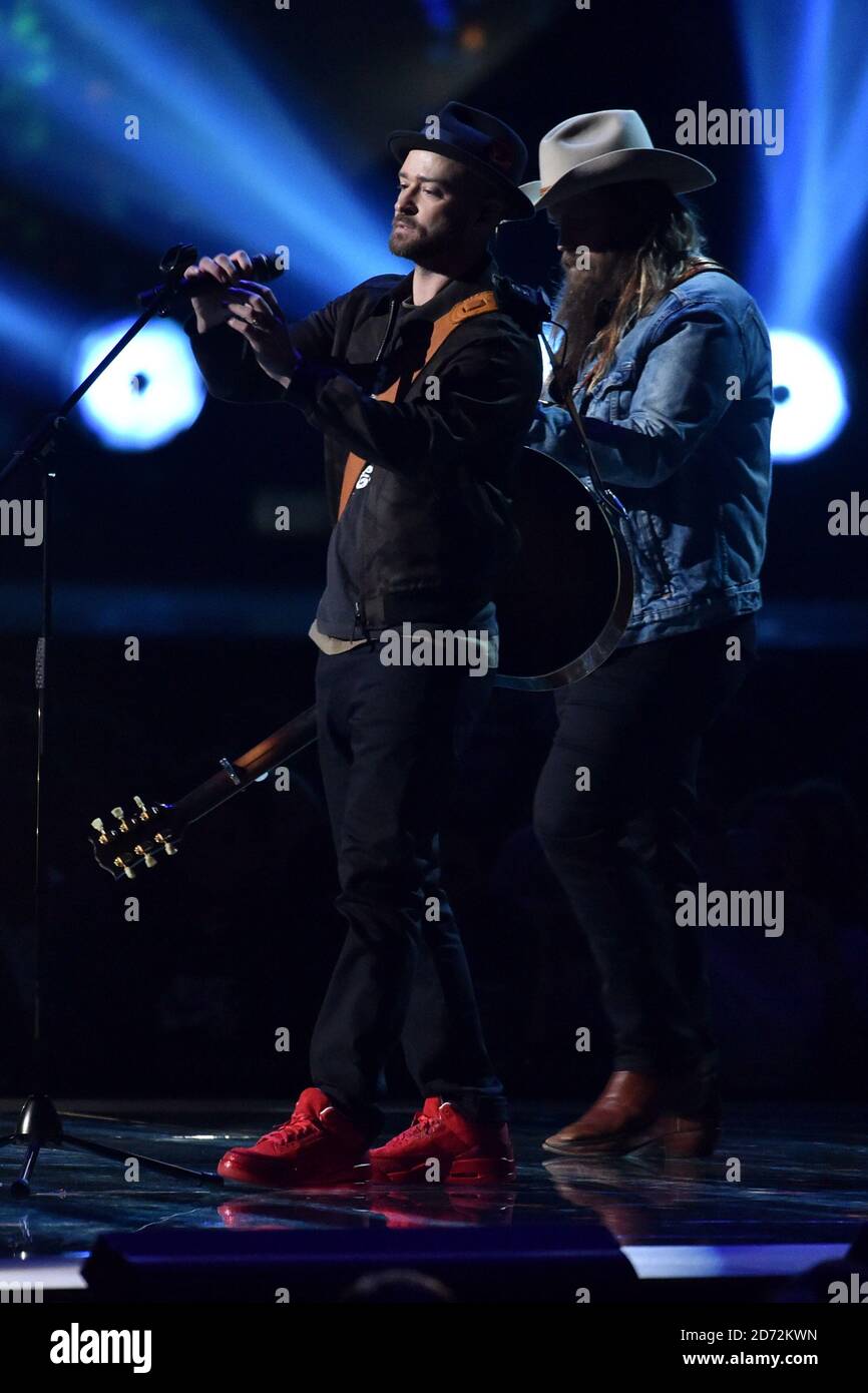 EDITORIAL USE ONLY. Chris Stapleton and Justin Timberlake perform on stage at the Brit Awards at ...