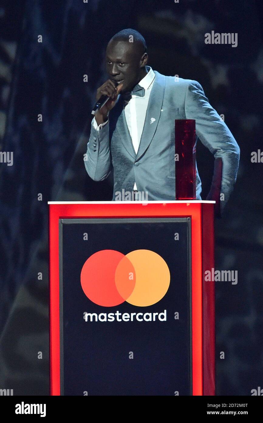 EDITORIAL USE ONLY. Stormzy accepting the Best British Solo Male award ...