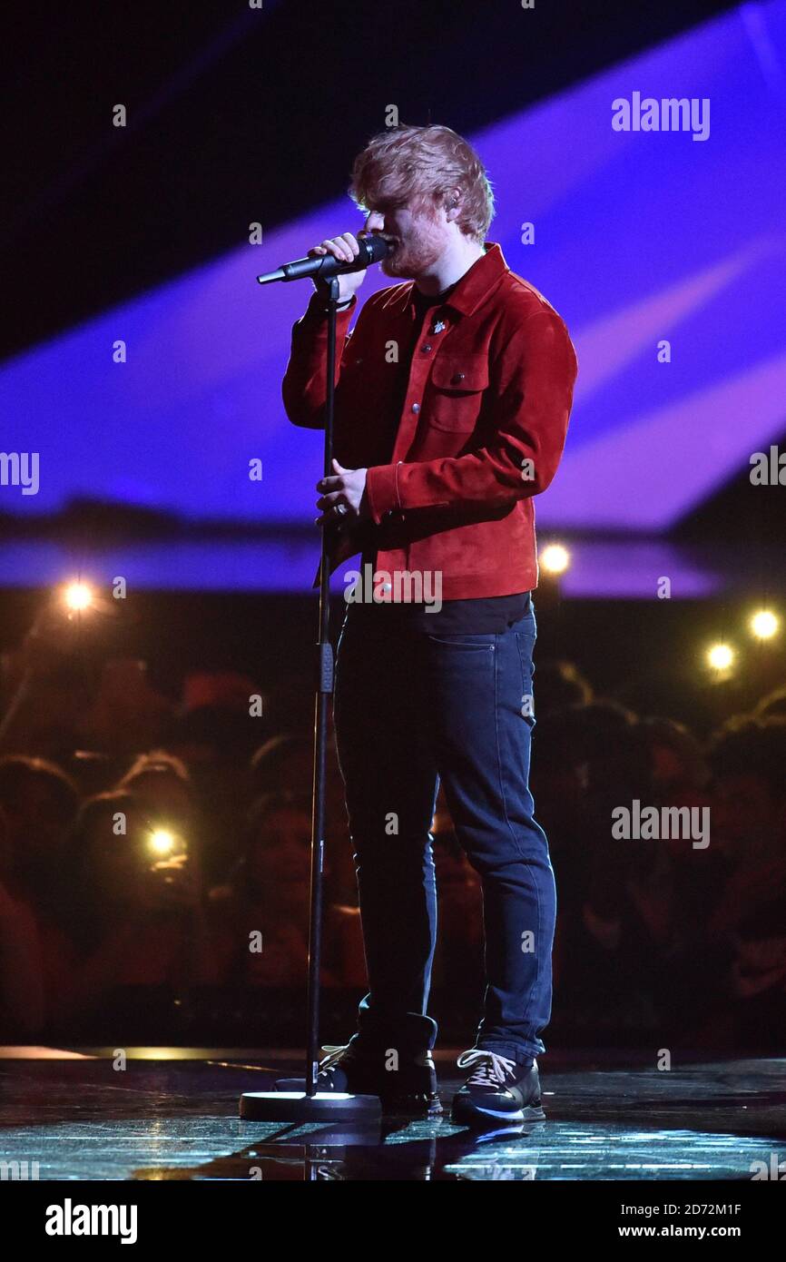 EDITORIAL USE ONLY. Ed Sheeran performs on stage at the Brit Awards at ...