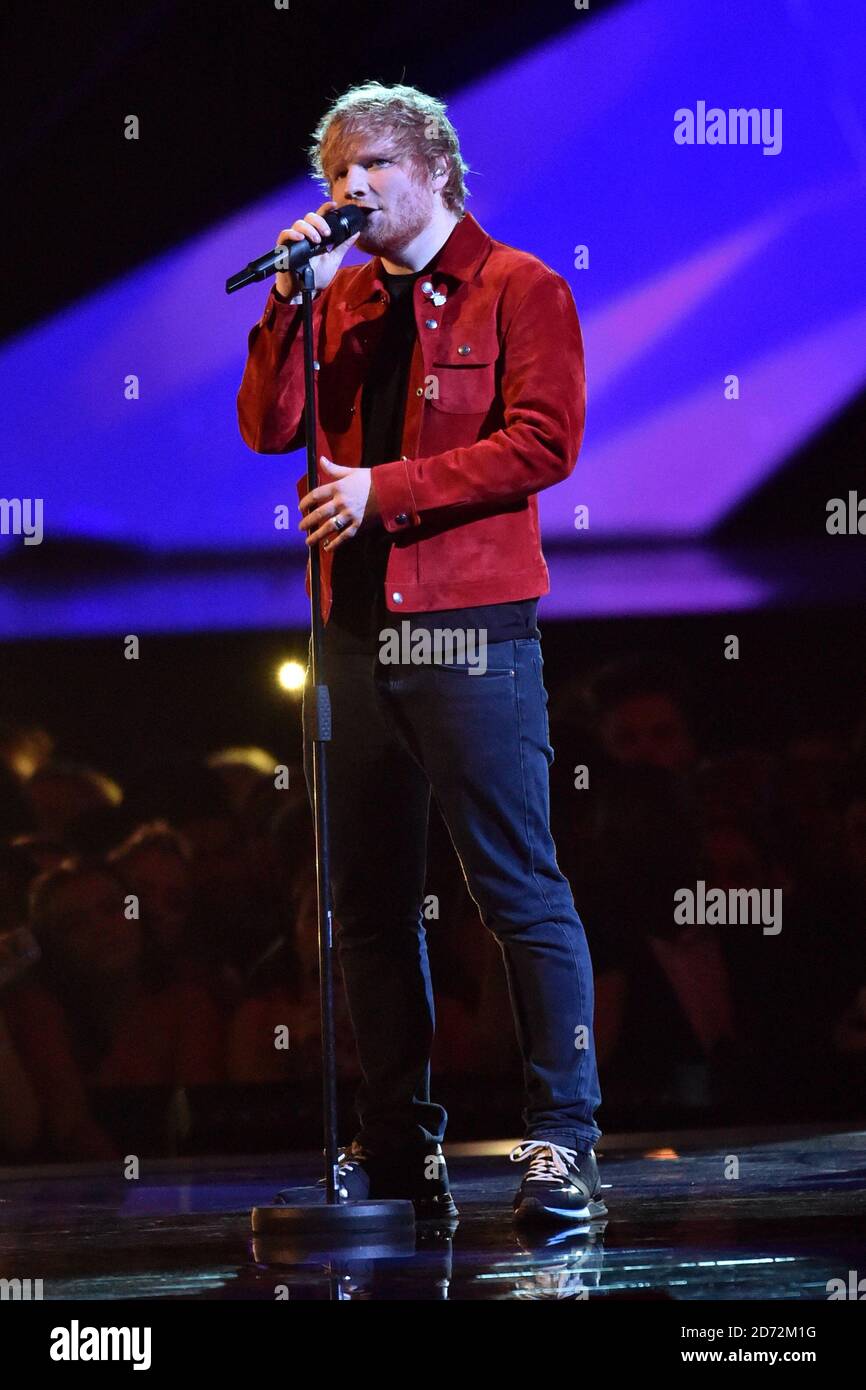 EDITORIAL USE ONLY. Ed Sheeran performs on stage at the Brit Awards at ...