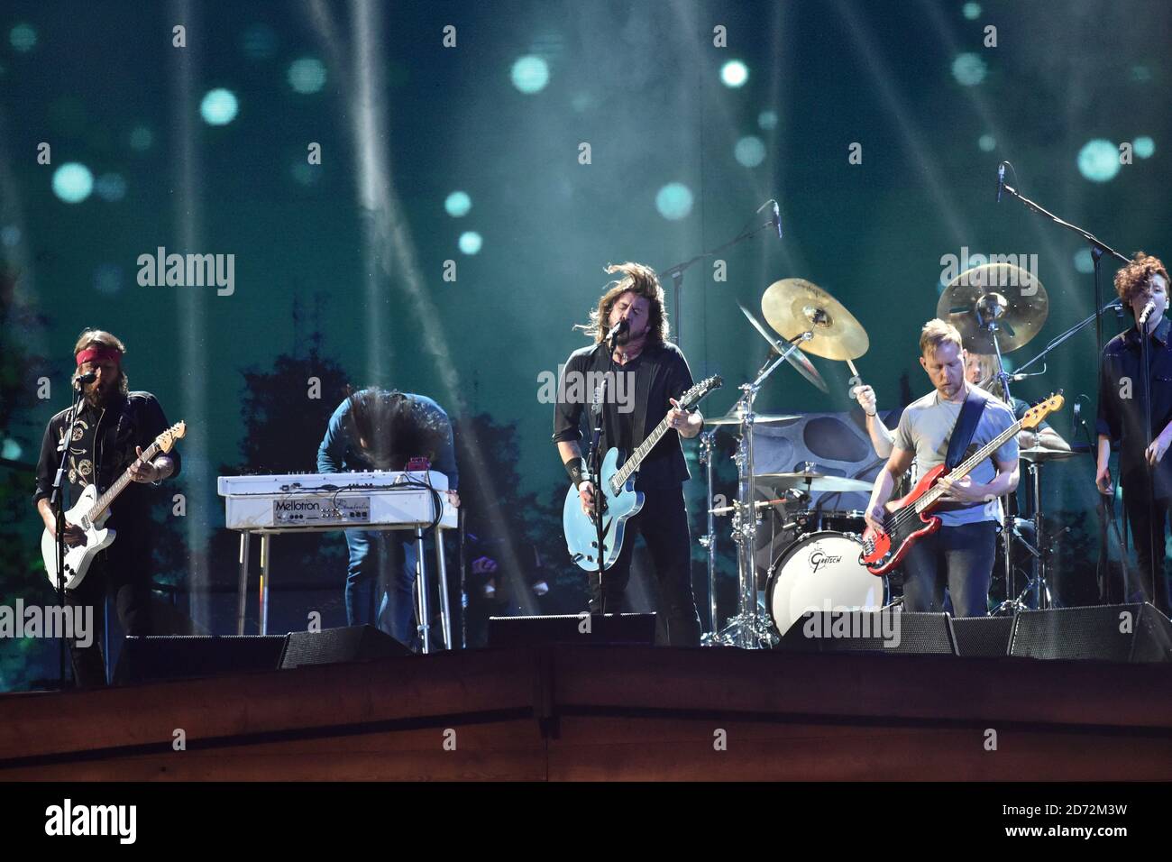 EDITORIAL USE ONLY. Foo Fighters performs on stage at the Brit Awards ...