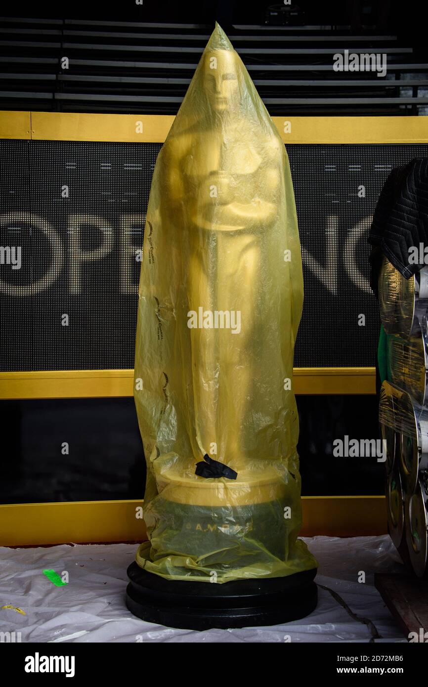 An Oscar statue is installed on the red carpet ahead of the 90th ...