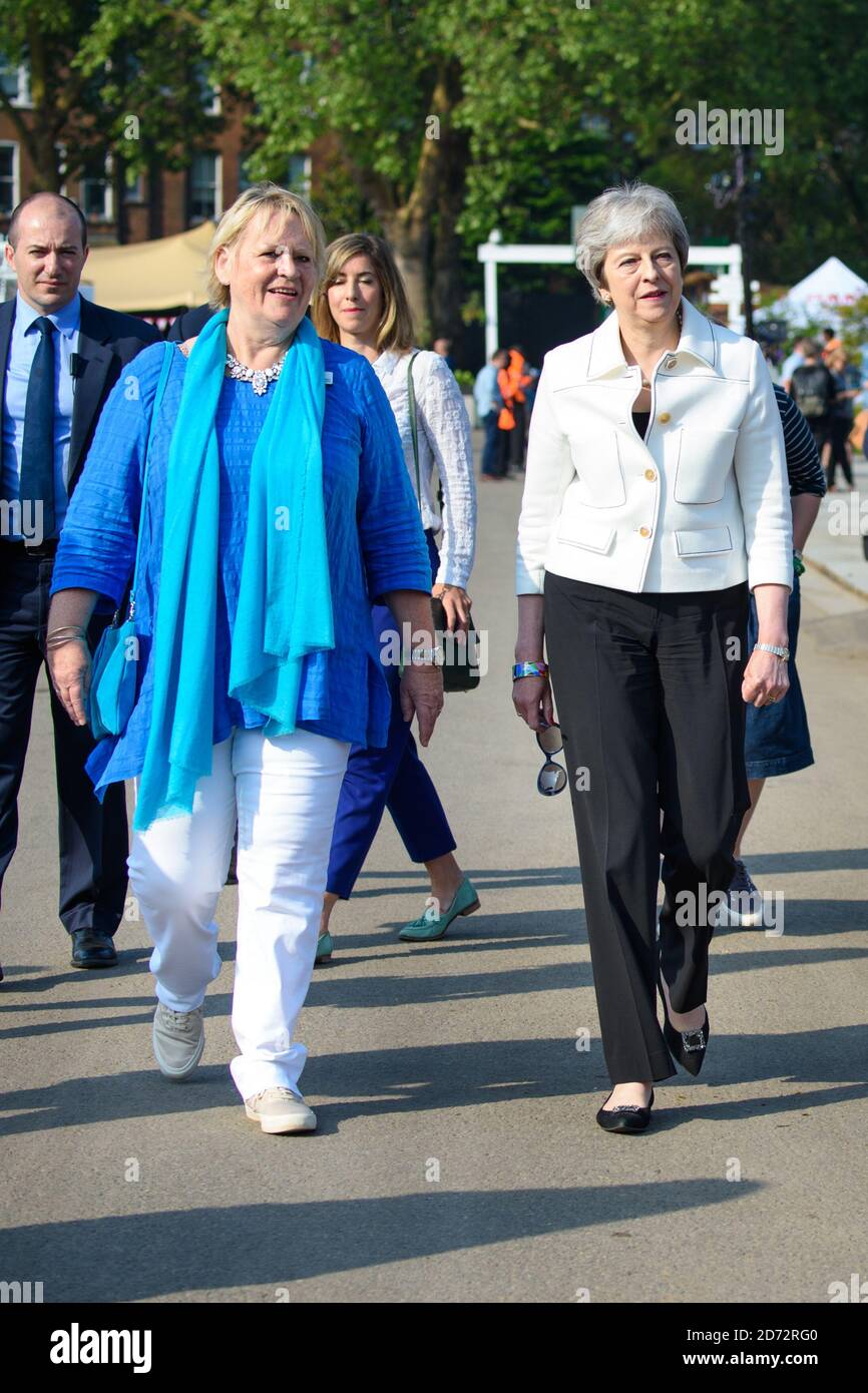 Prime Minister Theresa May, husband Philip and RHS director Sue Biggs ...