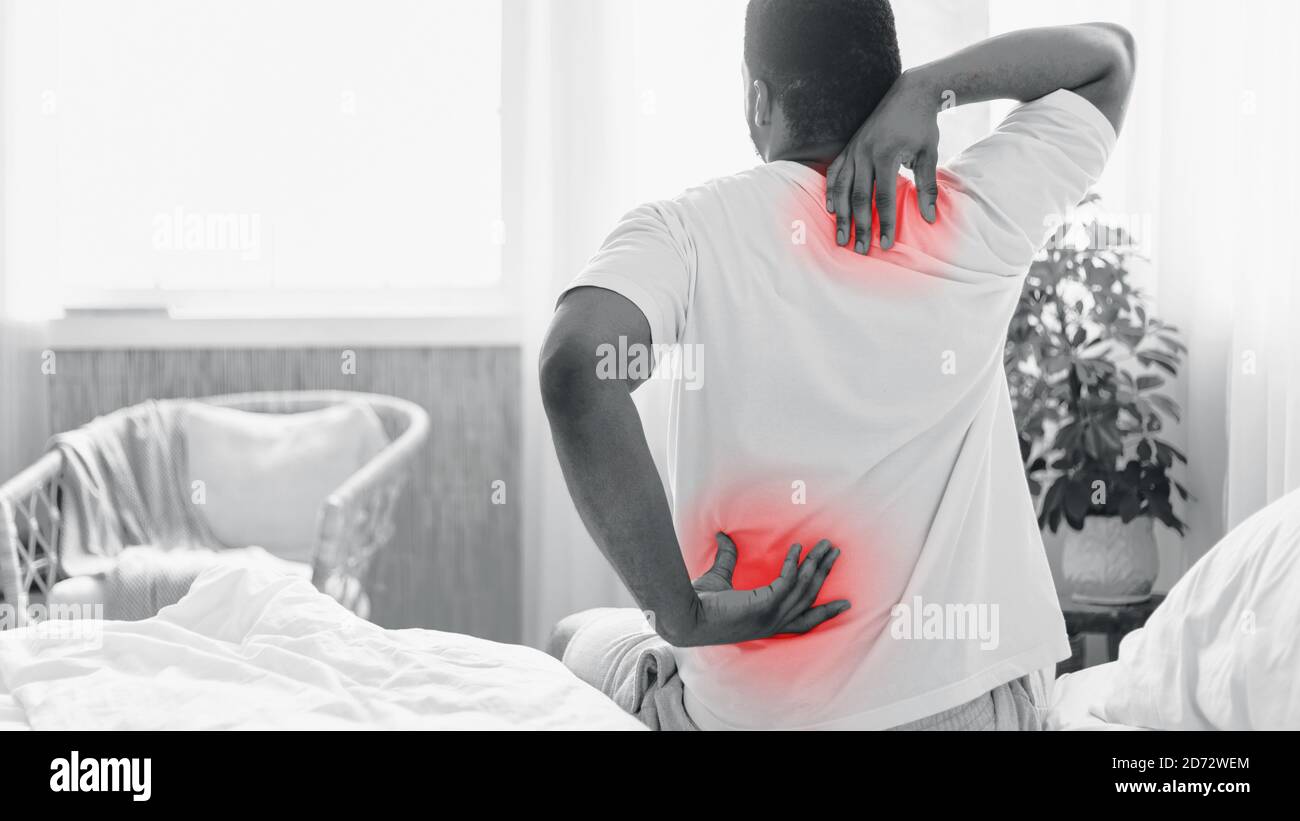 Young african man back pain hi-res stock photography and images - Alamy