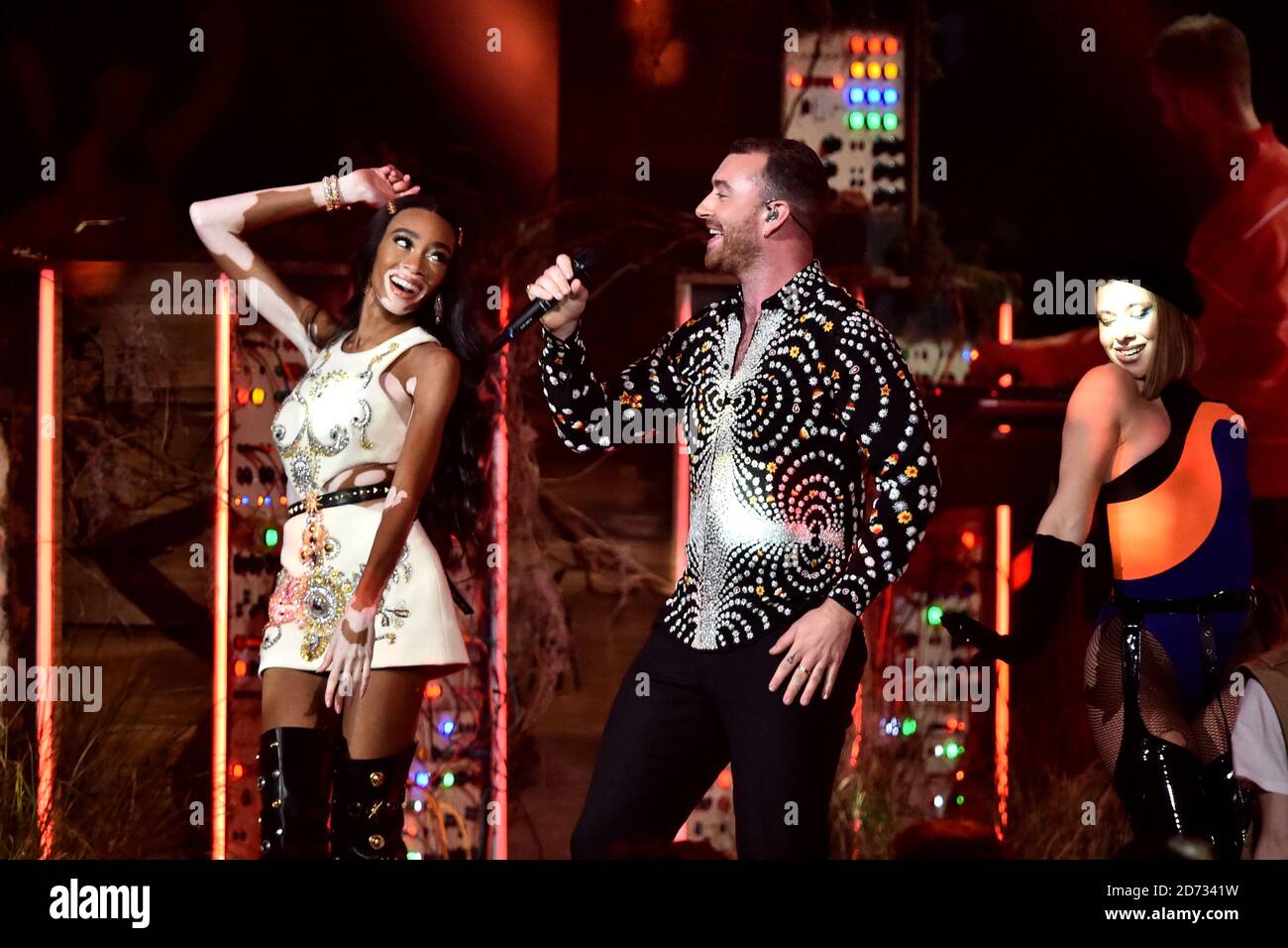 Winnie Harlow and Sam Smith on stage at the Brit Awards 2019 at the O2 ...