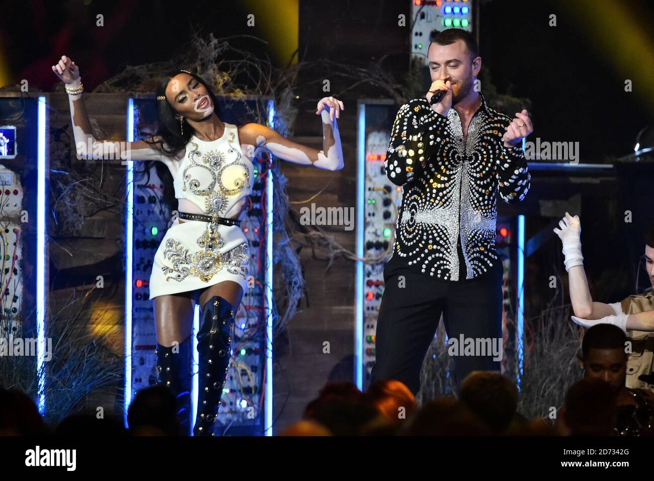 Winnie Harlow and Sam Smith on stage at the Brit Awards 2019 at the O2 ...