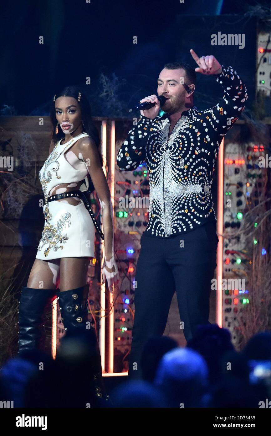 Winnie Harlow and Sam Smith on stage at the Brit Awards 2019 at the O2 ...