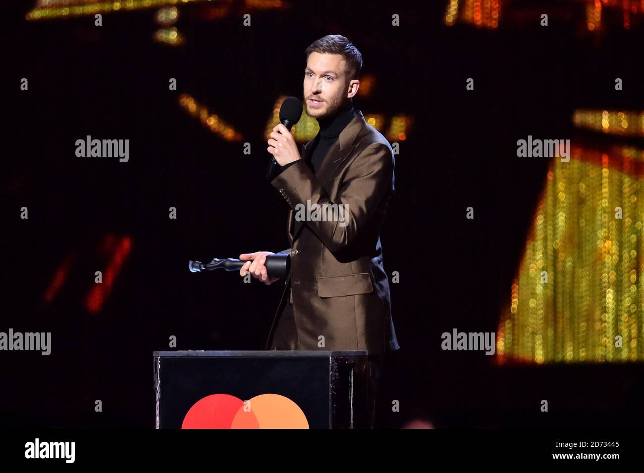Calvin Harris with the award for Best British Producer on stage at the ...
