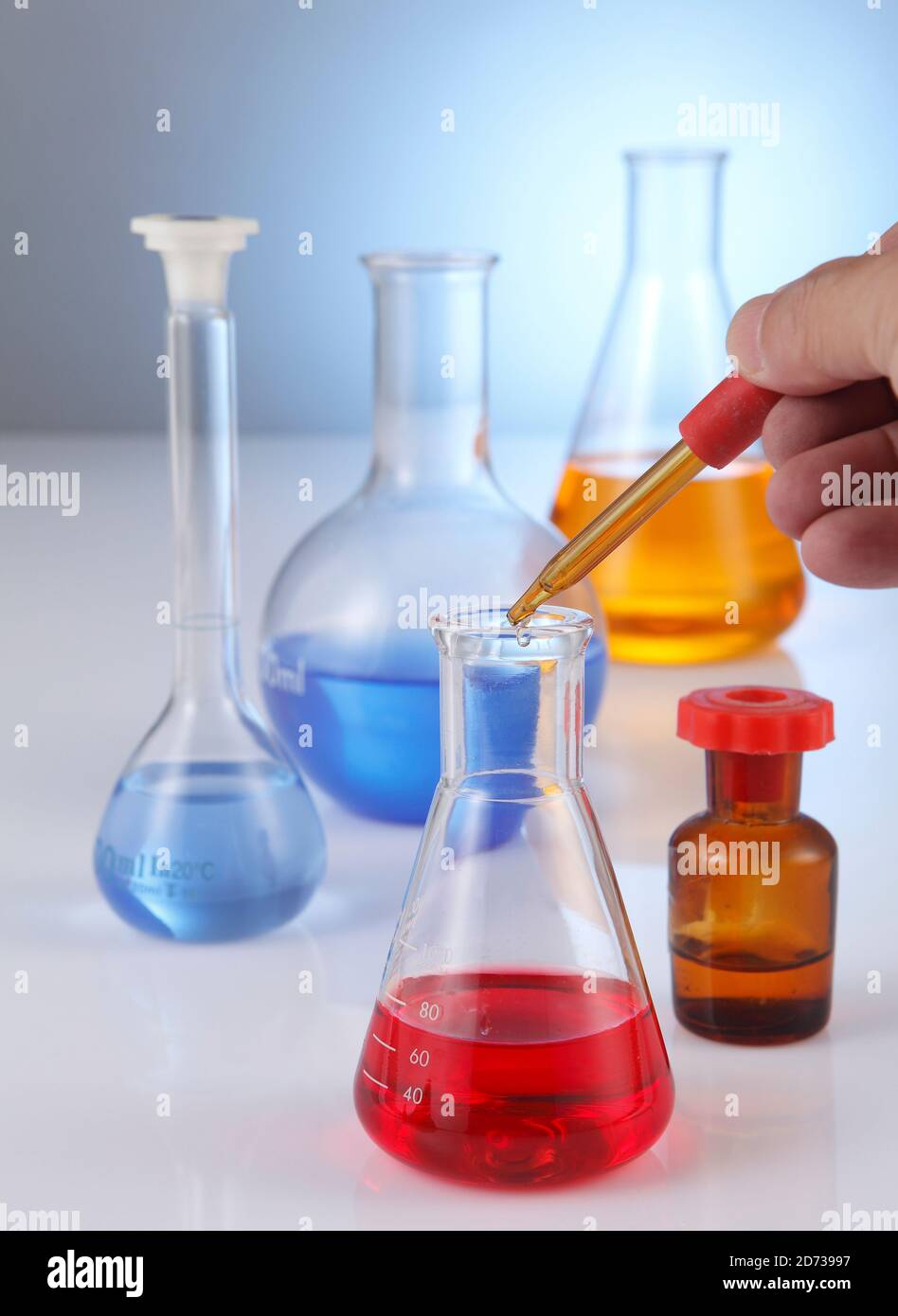 Chemical laboratory flask with liquid Stock Photo - Alamy