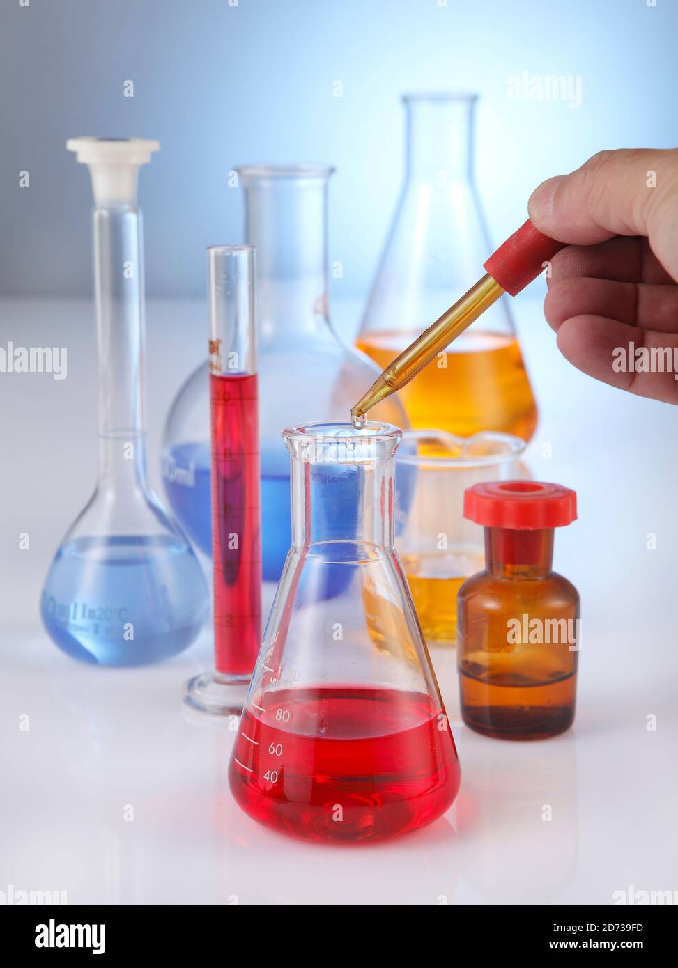 Chemical laboratory flask with liquid Stock Photo - Alamy