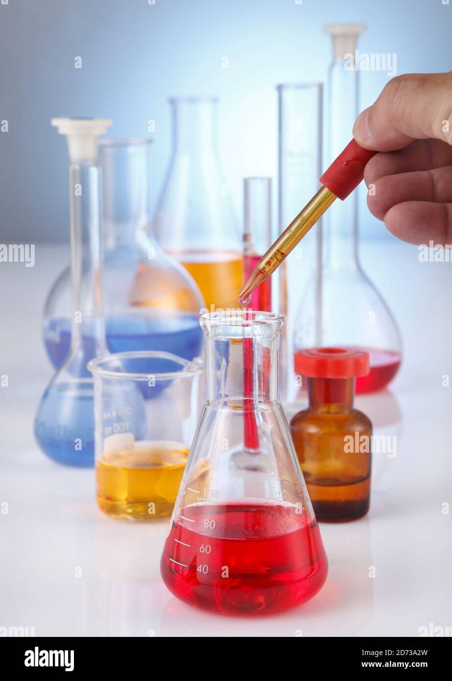 Chemical laboratory flask with liquid Stock Photo - Alamy