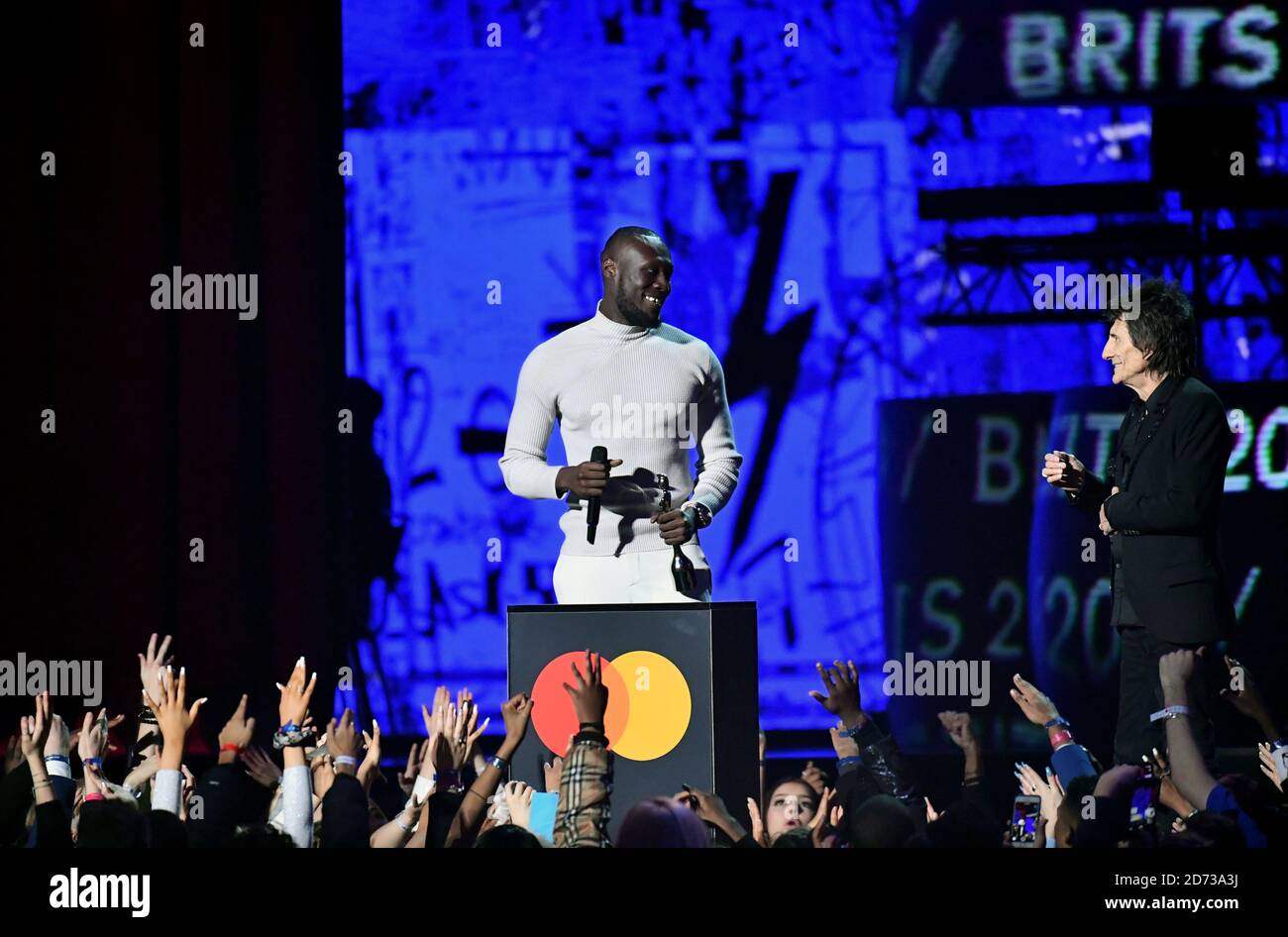 Male solo artist award on stage brit 2020 o2 arena hi-res stock ...