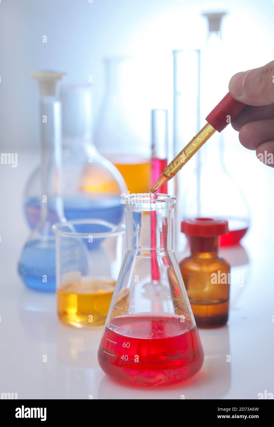 Chemical laboratory flask with liquid Stock Photo - Alamy