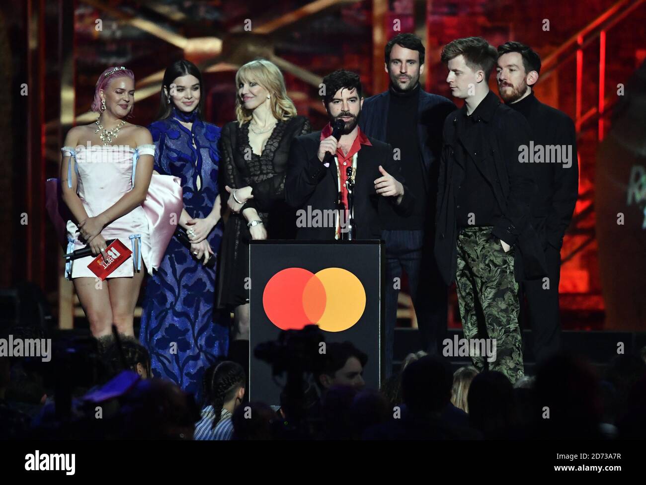 The Foals accept the group of the year award on stage at the Brit ...