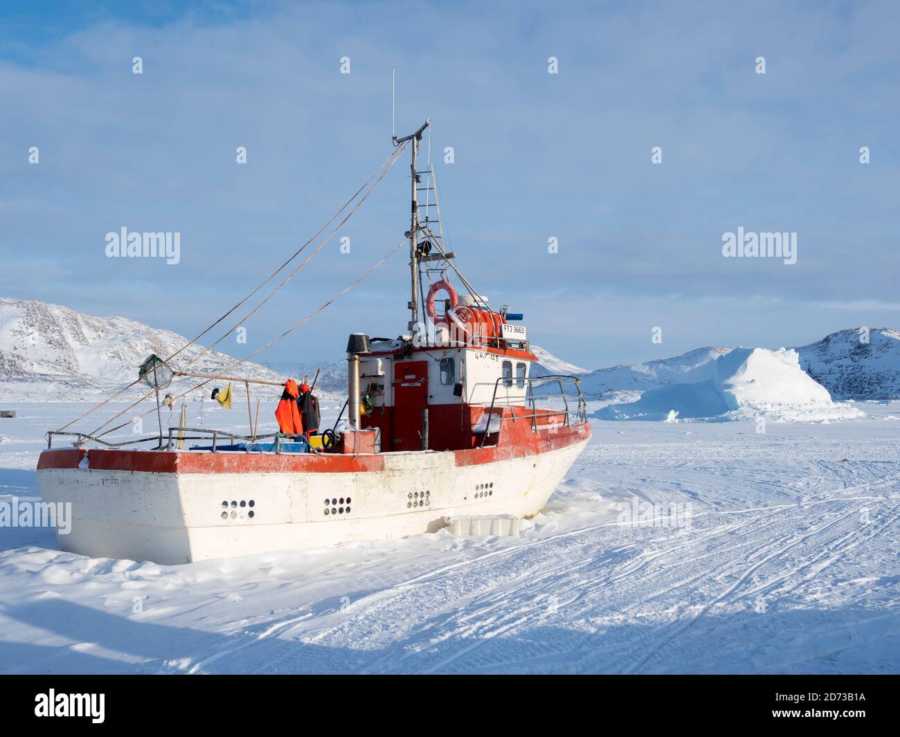 The fishing village Ikerasak during winter in the Uummannaq fjordsystem ...