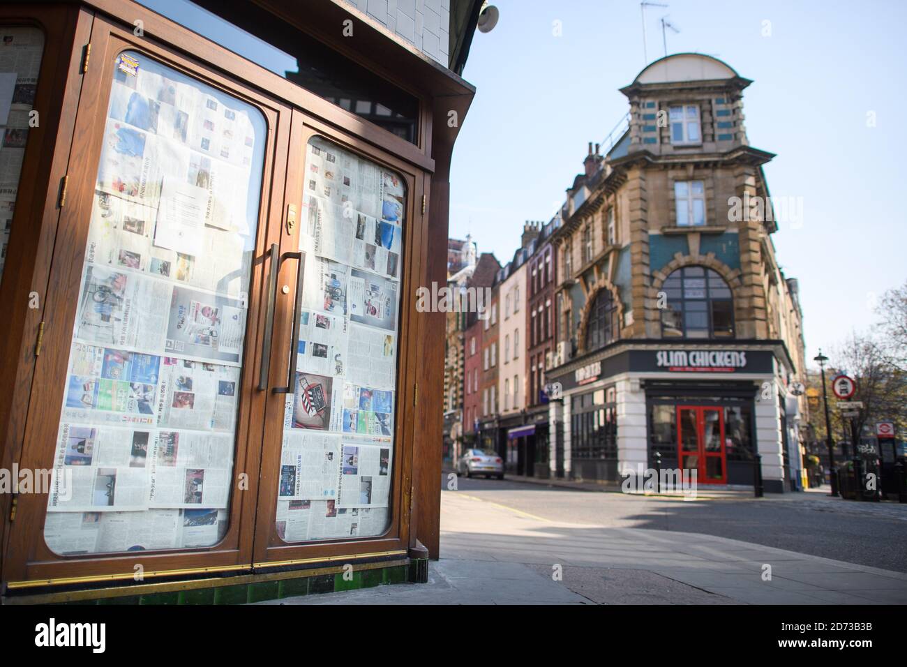 Empty streets and boarded up shops and restaurants Old Compton Street ...