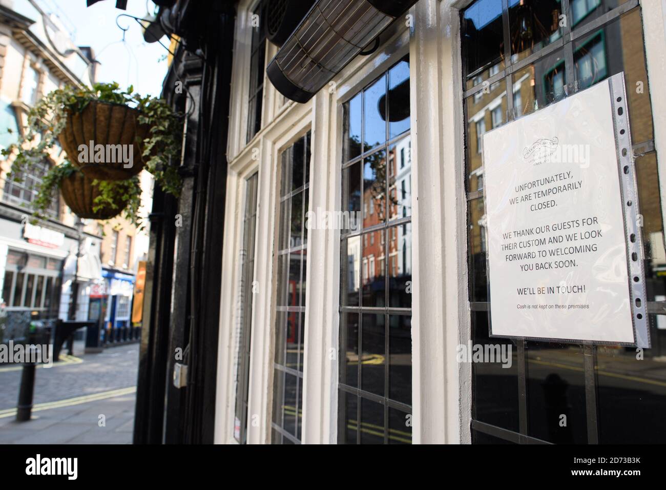 Empty streets and closed pubs and bars on Old Compton Street in Soho ...