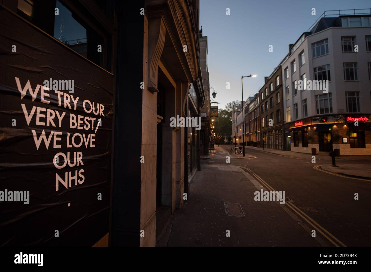 Closed bars and restaurants and empty streets on a Saturday night in ...