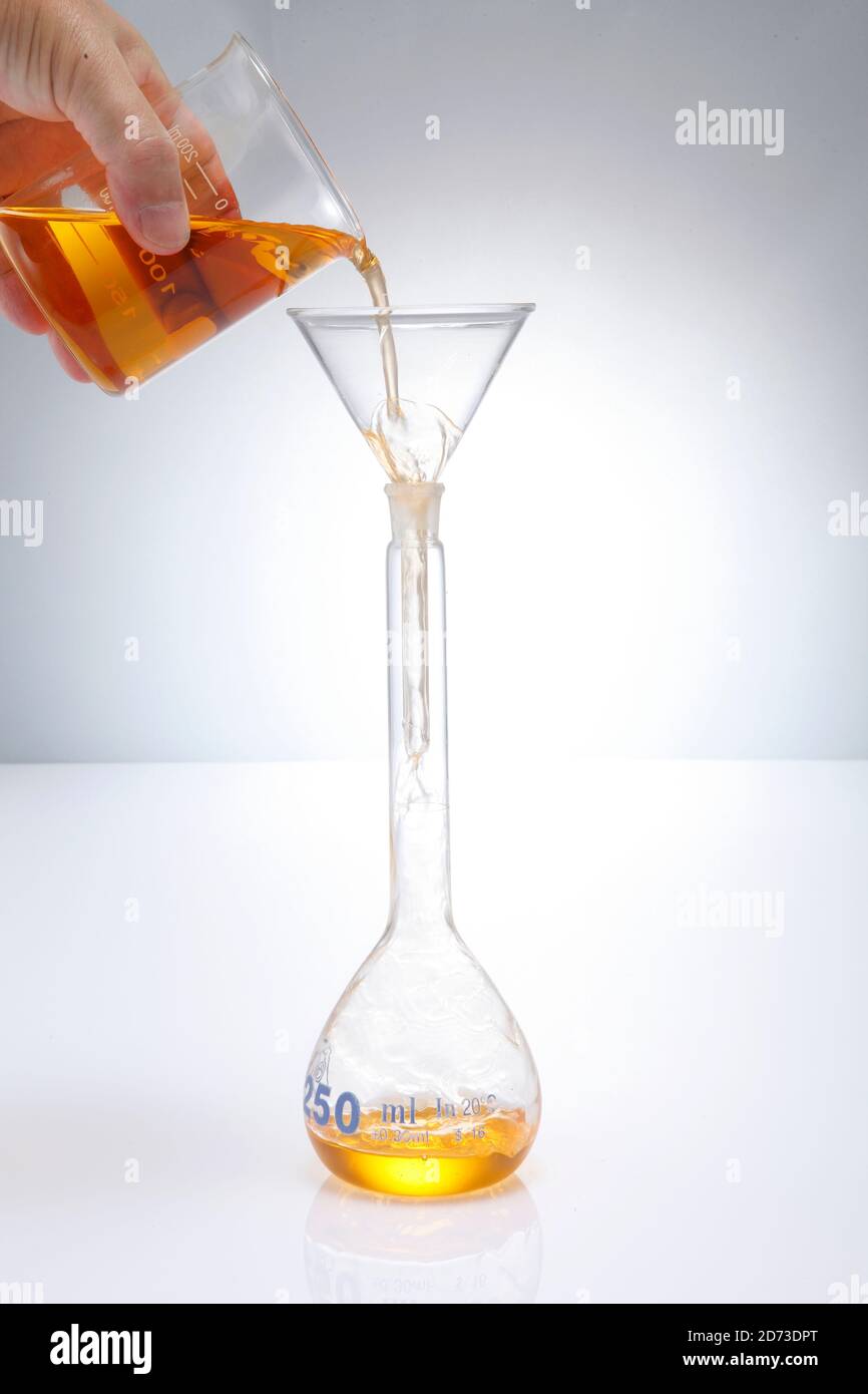 Chemical laboratory flask with liquid- Volumetric Flask Stock Photo - Alamy