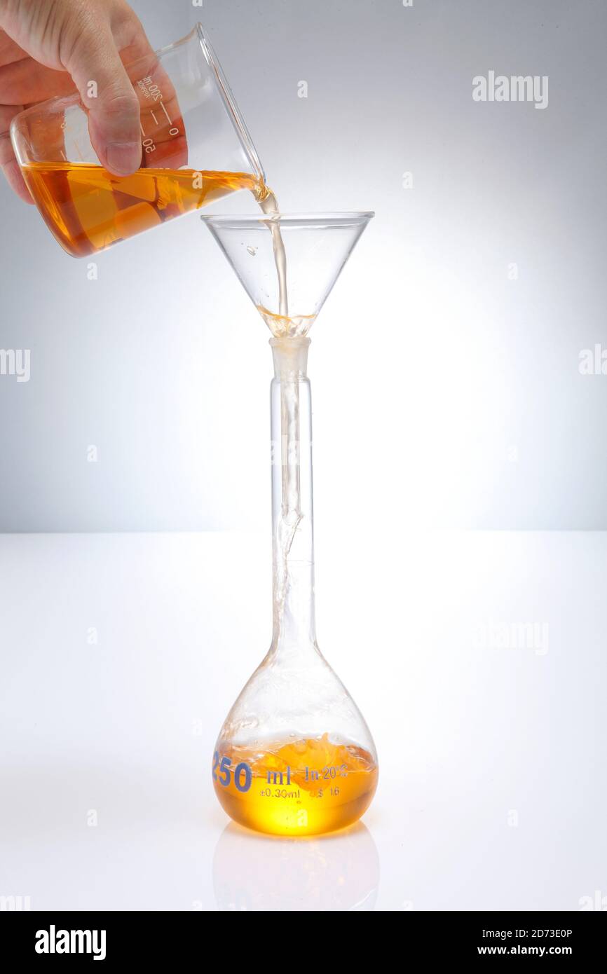 Chemical laboratory flask with liquid- Volumetric Flask Stock Photo - Alamy
