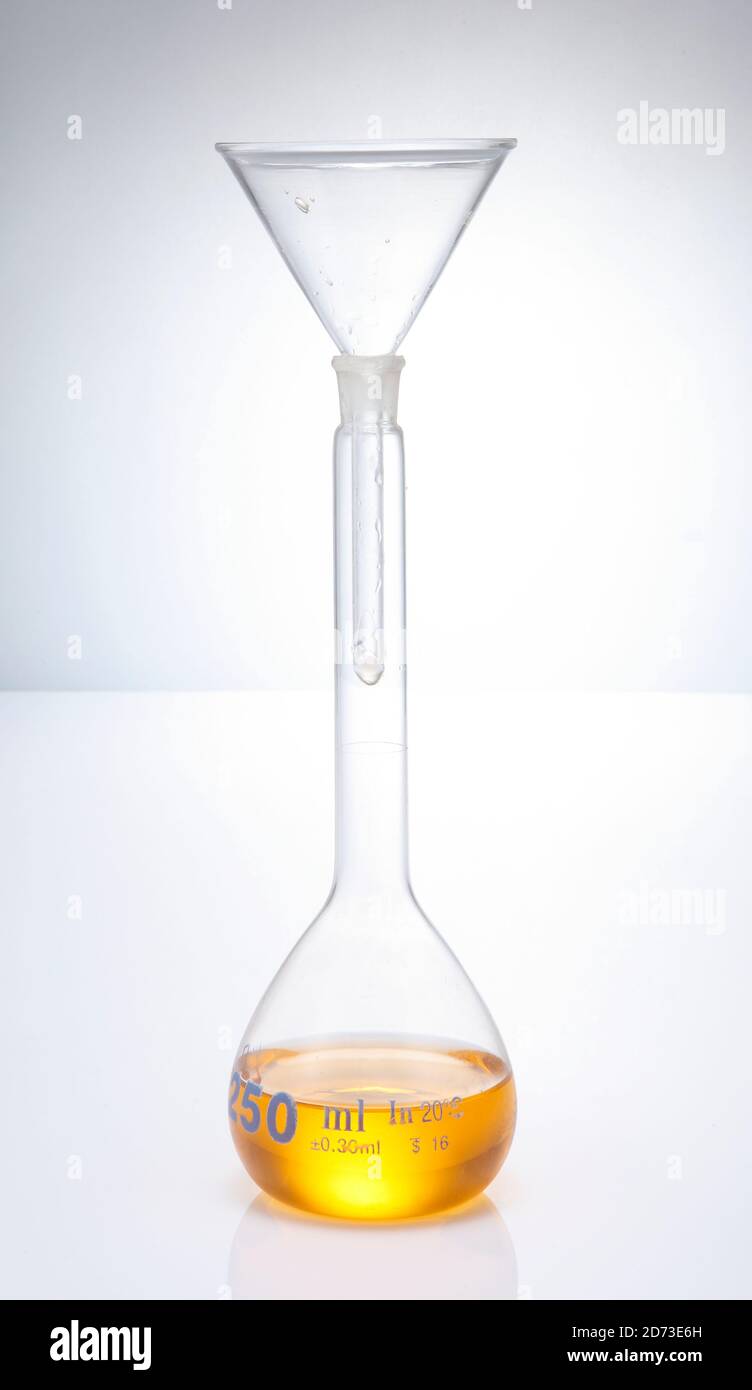 Chemical laboratory flask with liquid- Volumetric Flask Stock Photo - Alamy