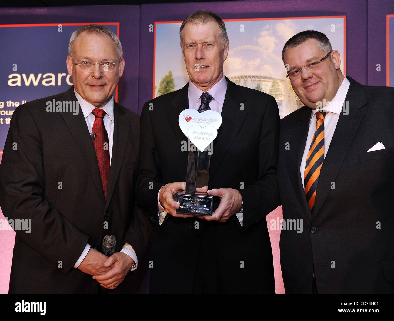 Gary Newbon (left) with Sir Geoff Hurst (centre) who received the ...