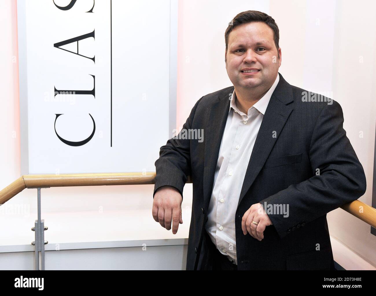 Paul Potts poses for photographs before being interviewed on Classic FM ...